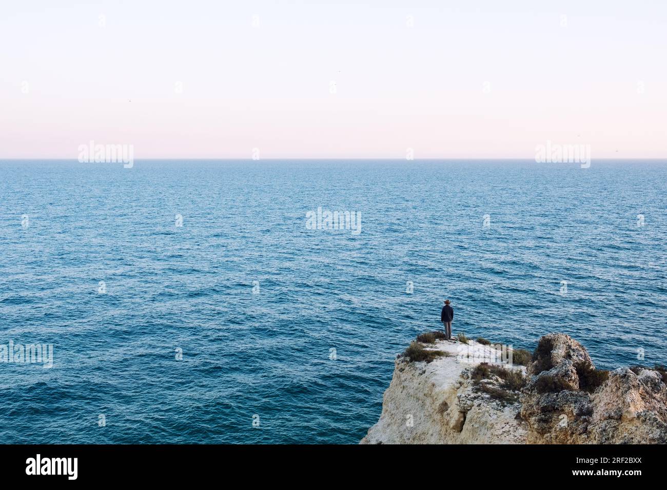 Tourist in hat stands sea hi-res stock photography and images - Alamy