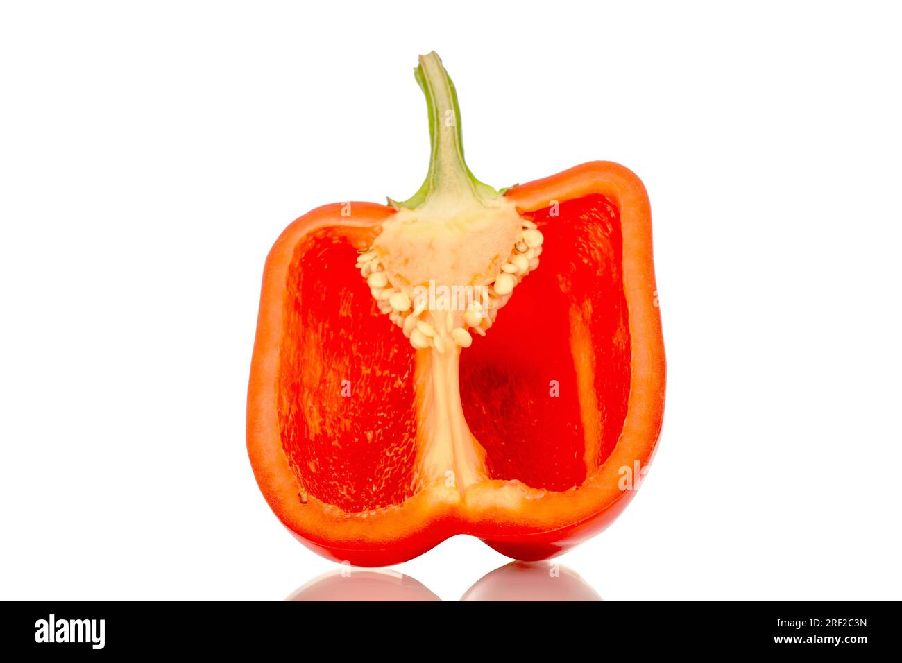 One half of sweet red pepper, macro, isolated on white background Stock ...