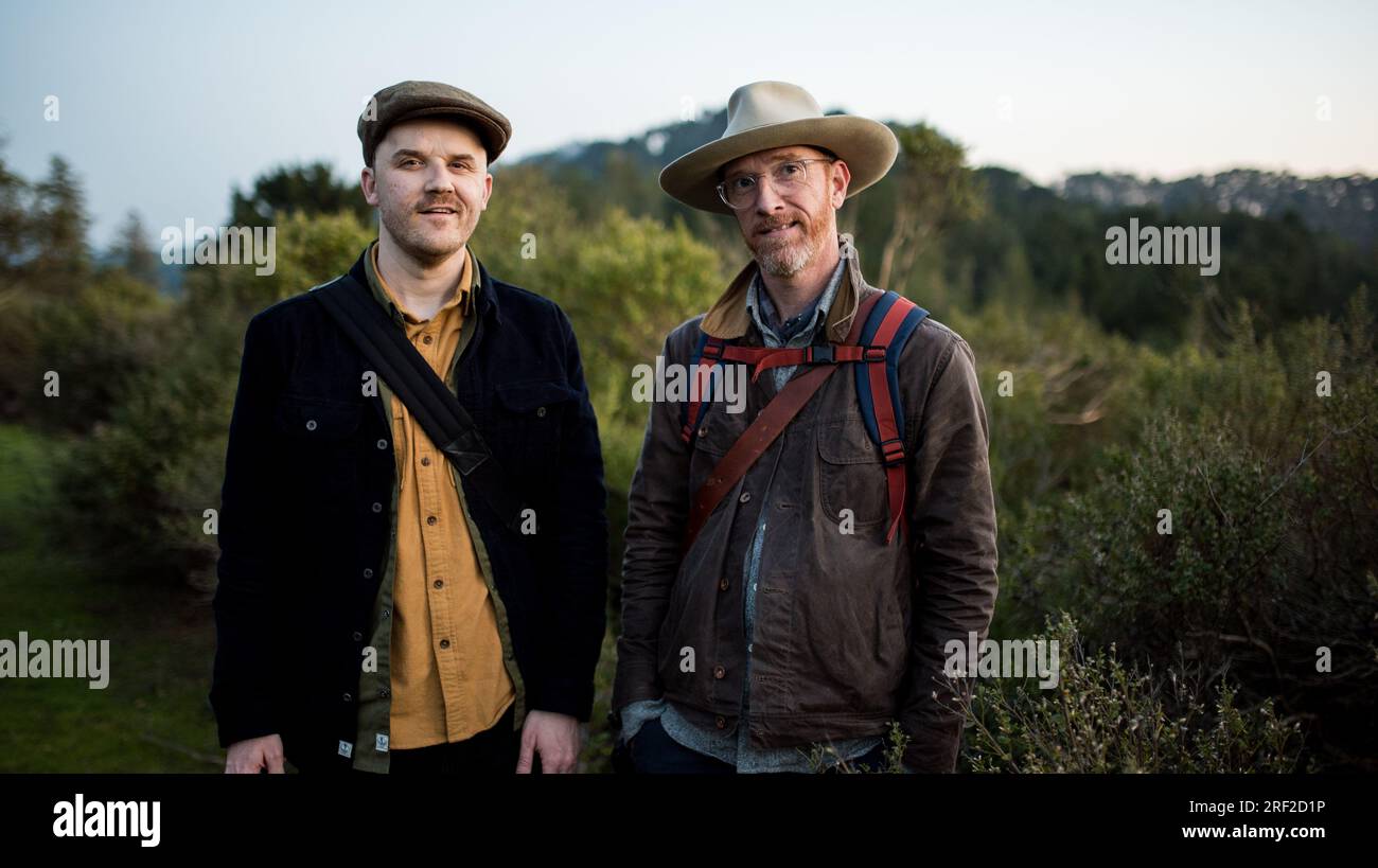 Portrait of two guys in nature Stock Photo - Alamy