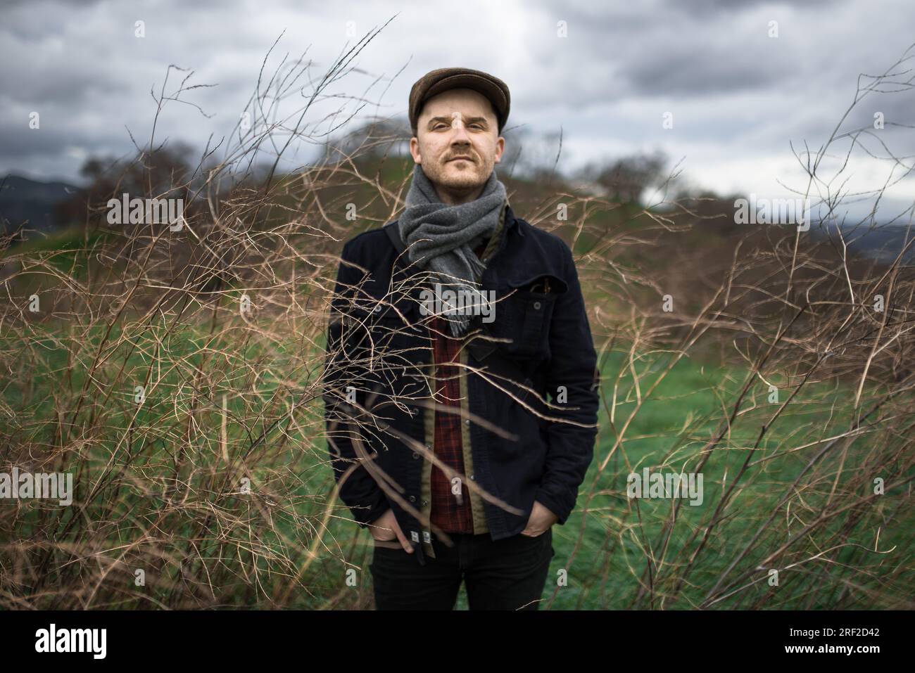 Tall man standing hi-res stock photography and images - Alamy