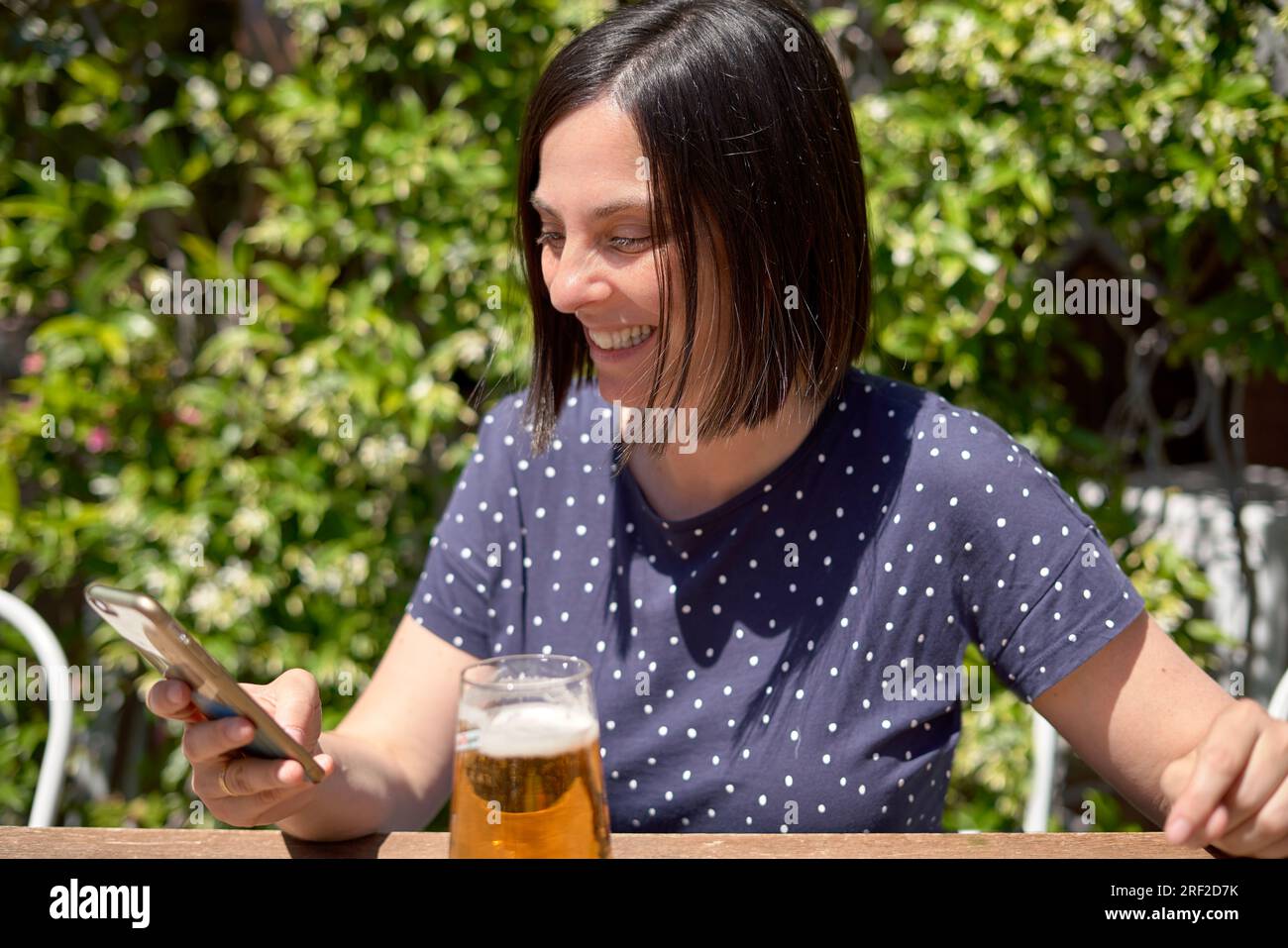 Drinking beer sitting on street hi-res stock photography and images - Alamy