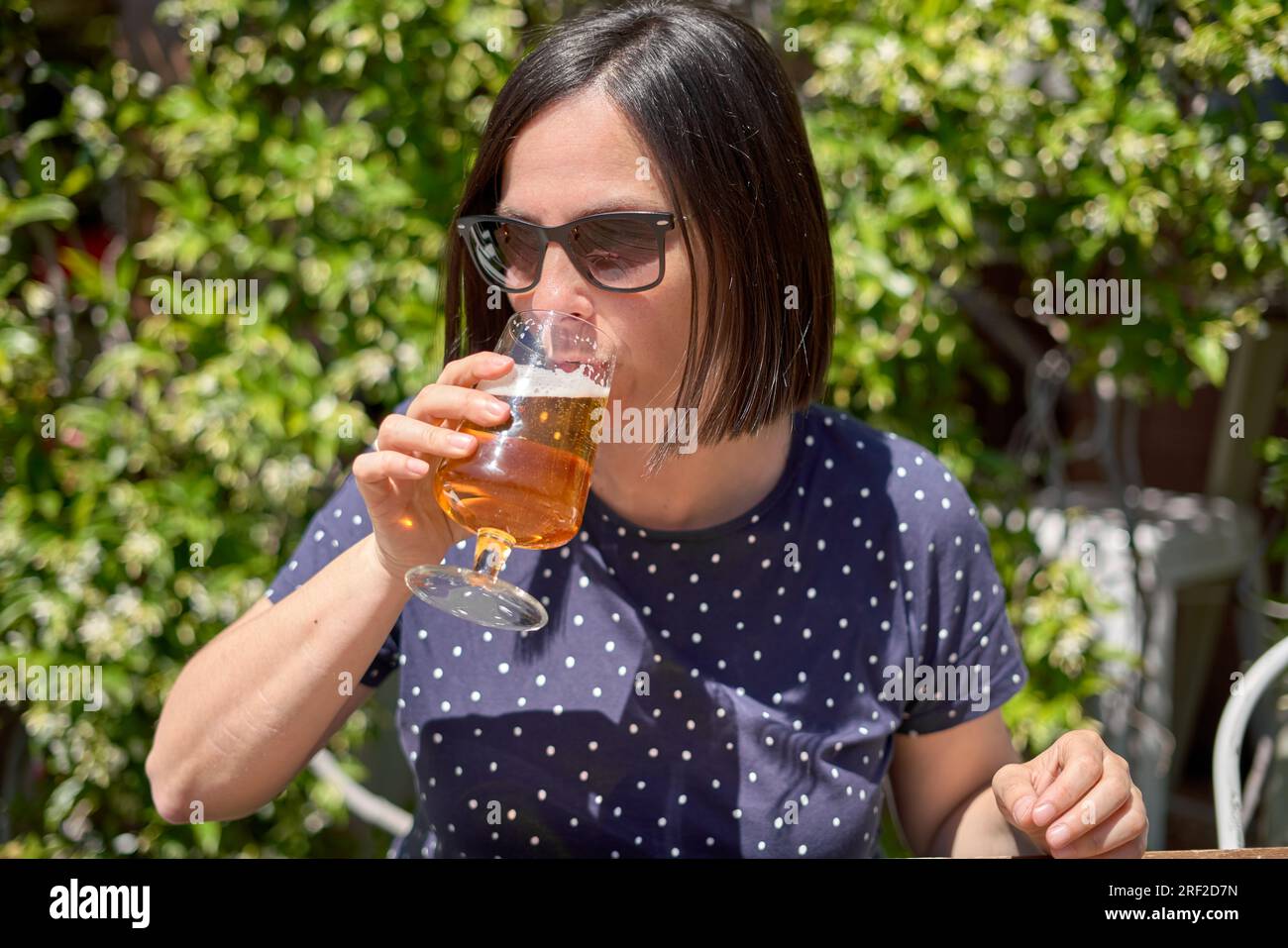 Drinking beer sitting on street hi-res stock photography and images - Alamy