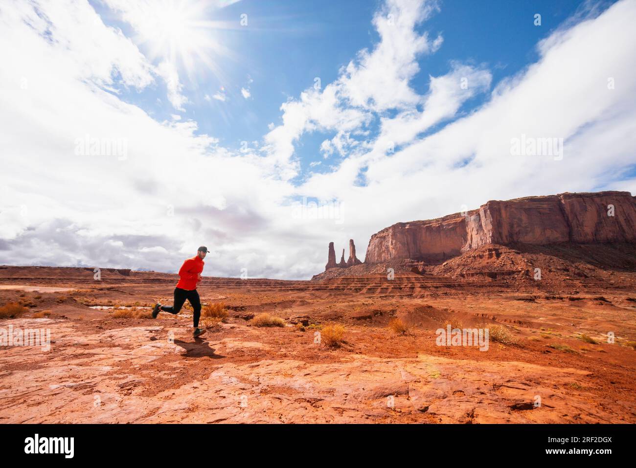 Trail Runner in Monument Valley Stock Photo - Alamy
