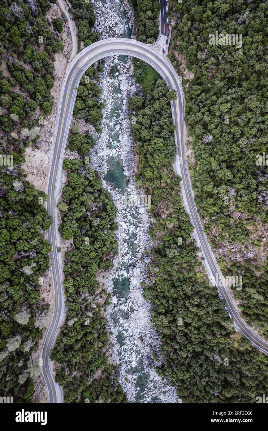Aerial view of snaking road and bridge over Yuba River, California ...
