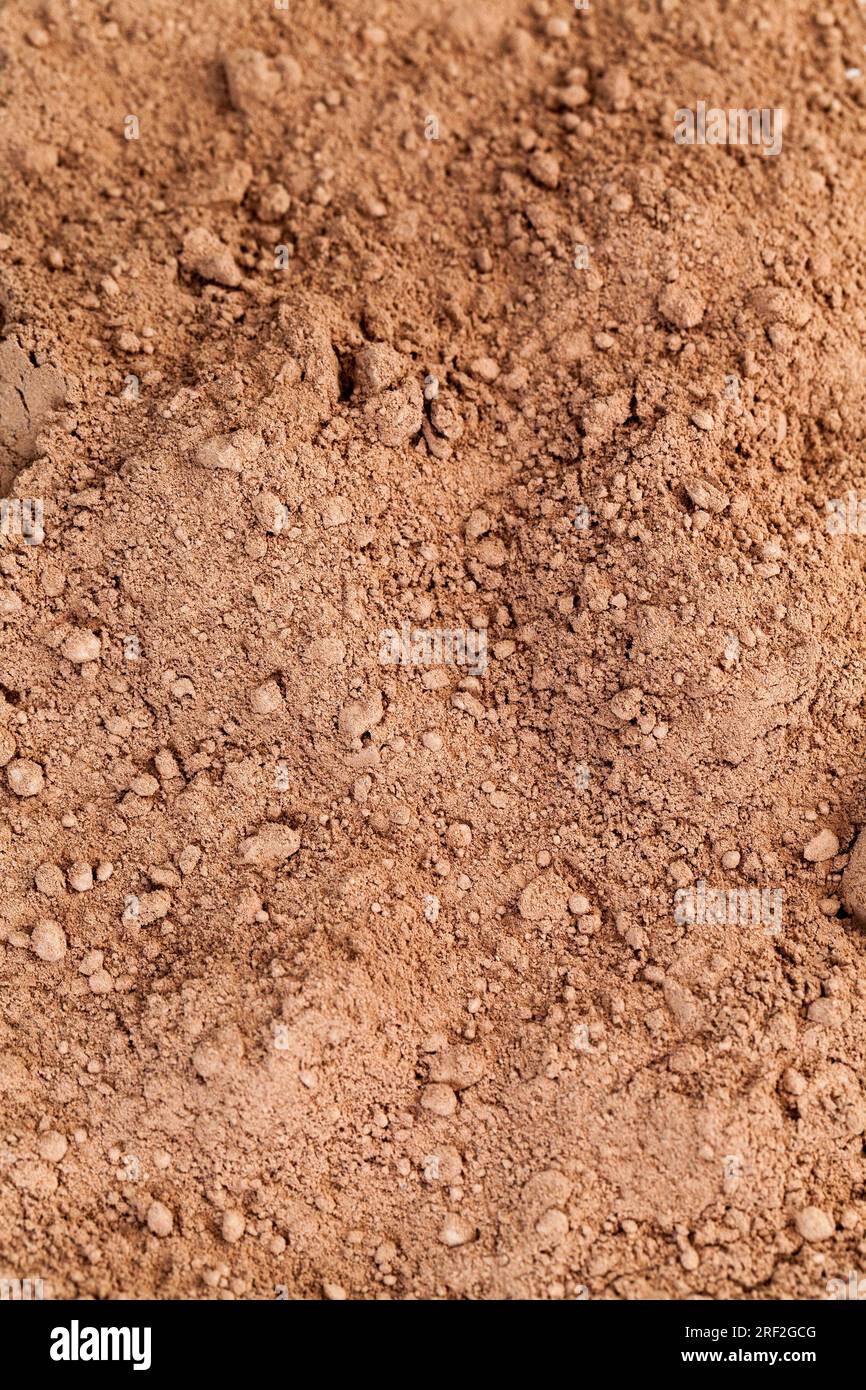 a large pile made from cocoa bean powder for making chocolate or other ...