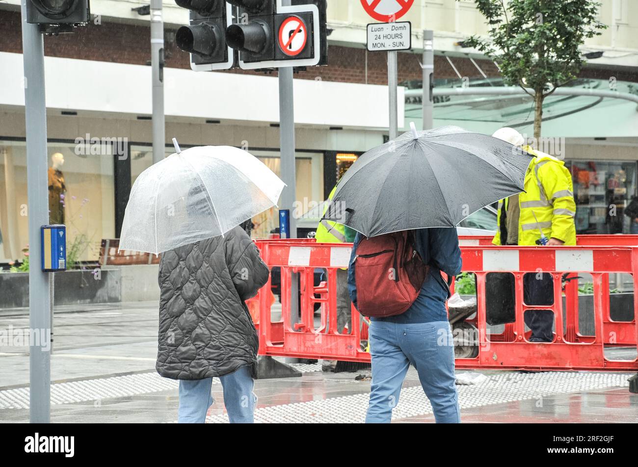 People with umbrella Stock Photo - Alamy