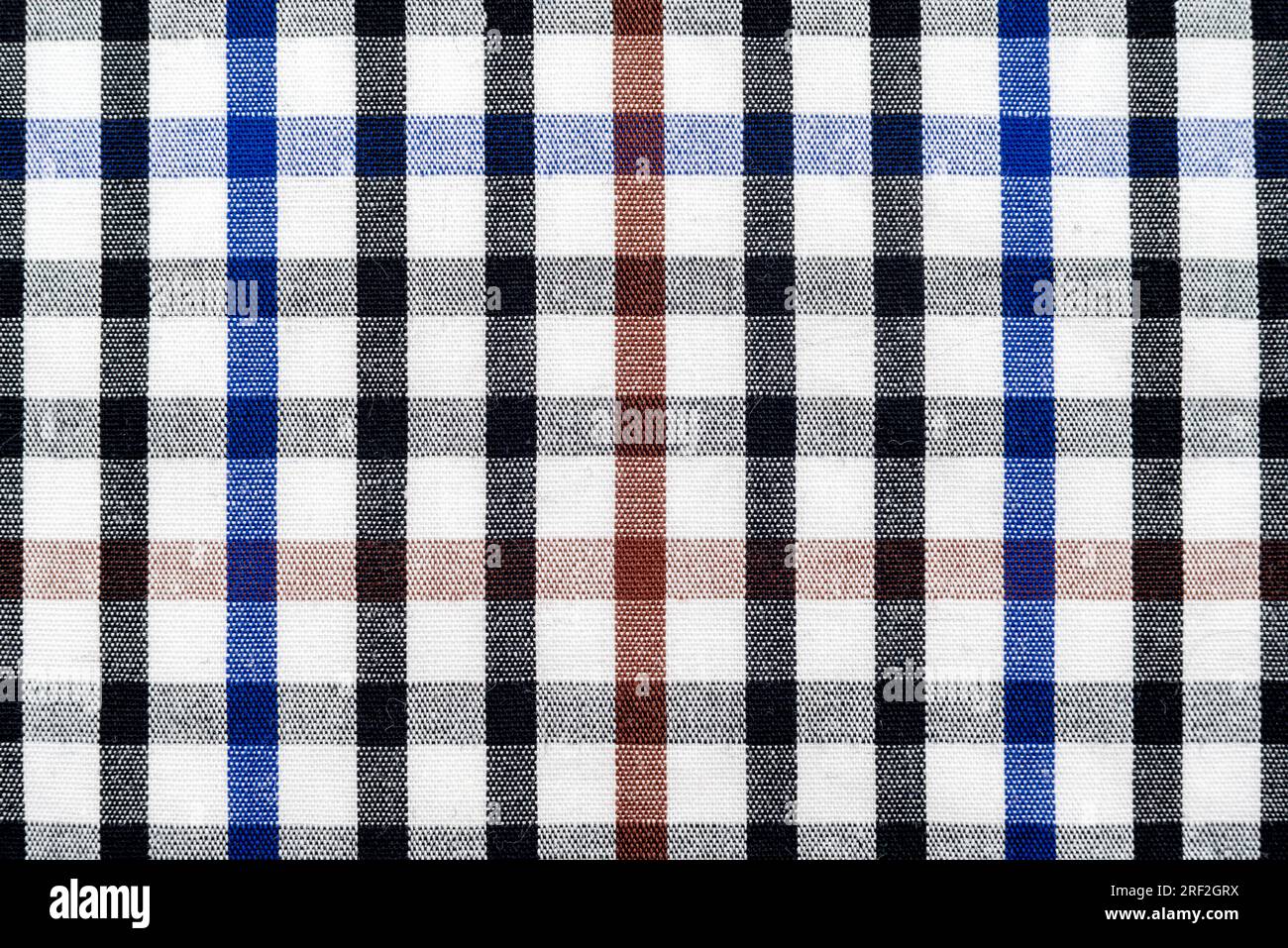 The texture of linen fabric in a large cell of black, blue and white ...