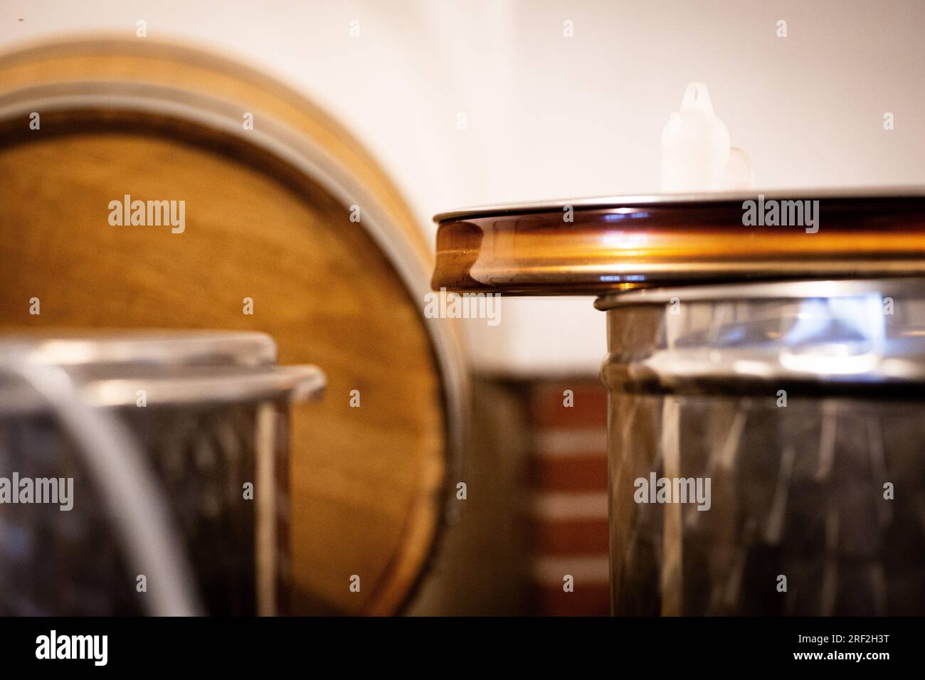 Winery - barrels with vine in small family vineard Stock Photo - Alamy