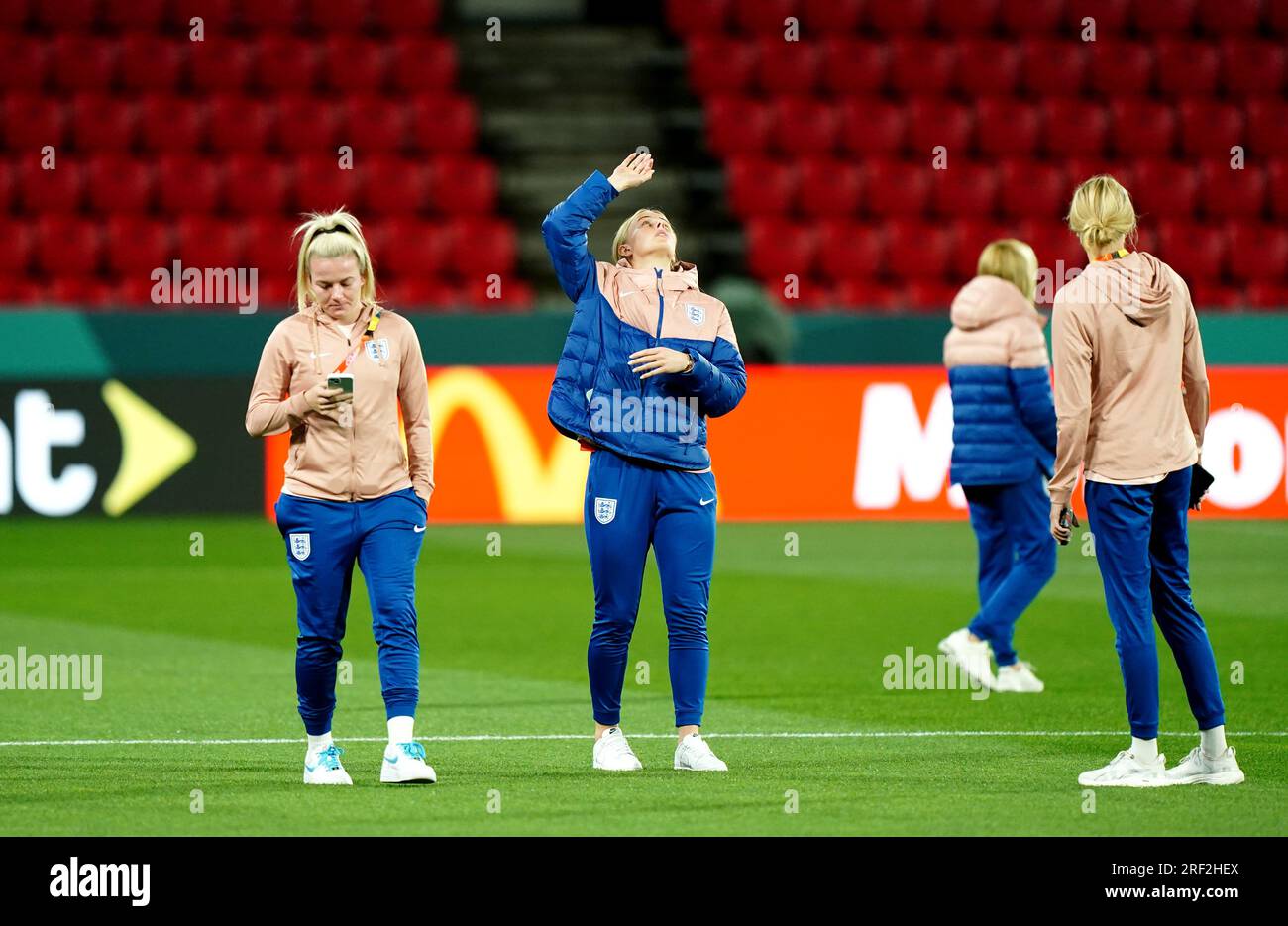 England's Lauren Hemp (left) and Hannah Hampton walk the pitch at the ...
