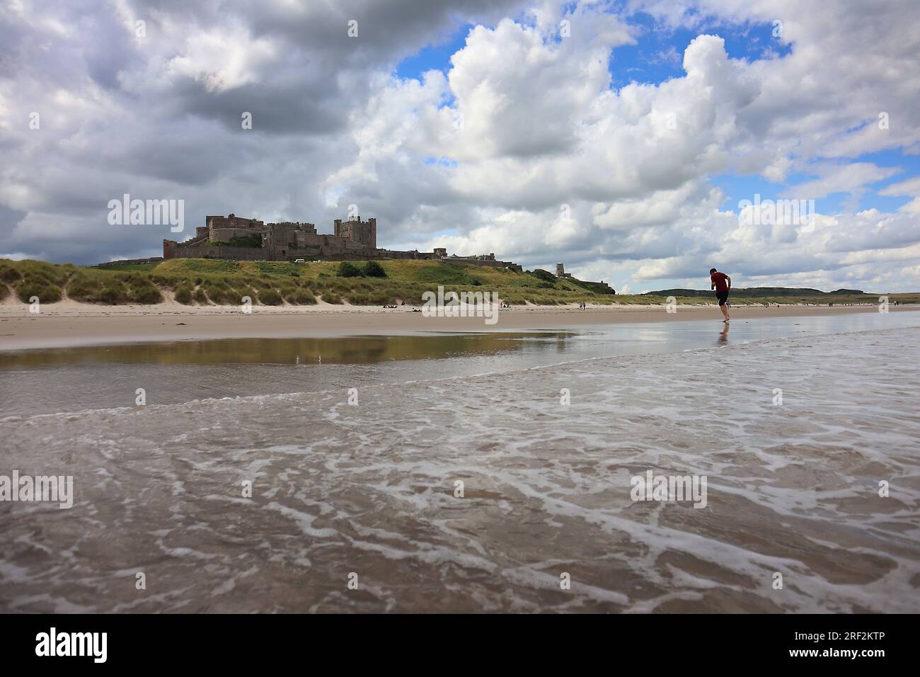 Englands finest coastal castle dominates the village of bamburgh in hi ...