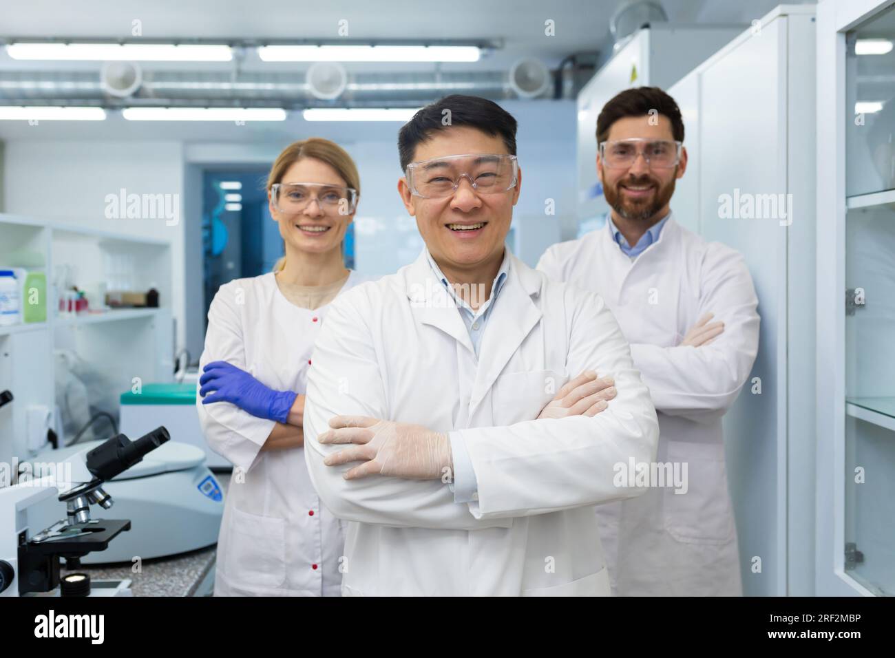 Group young successful scientists hi-res stock photography and images ...