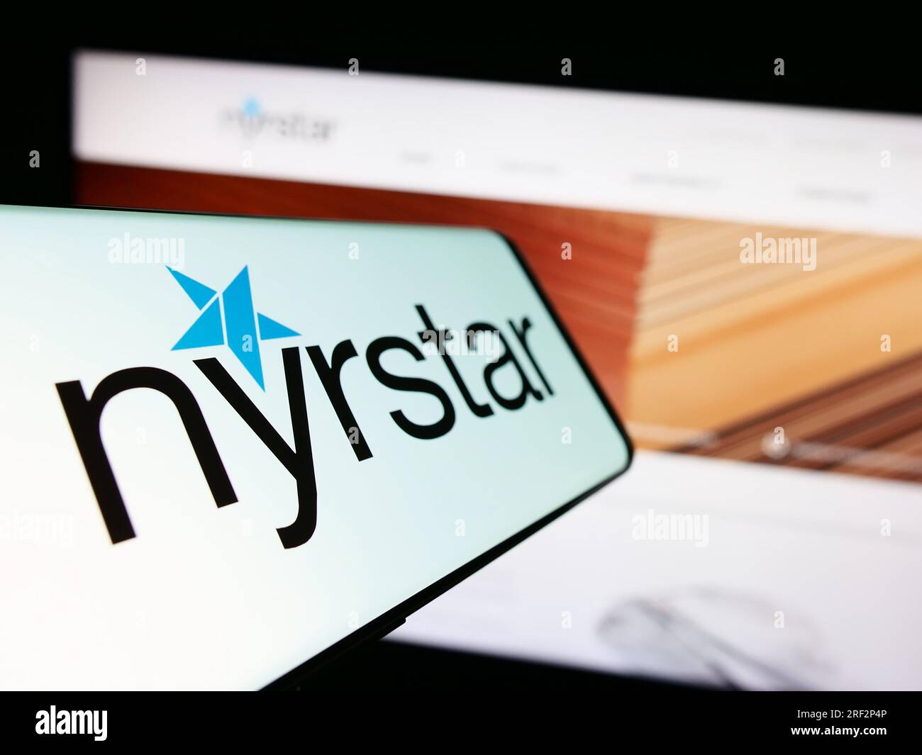 Mobile phone with logo of Dutch mining company Nyrstar on screen in ...