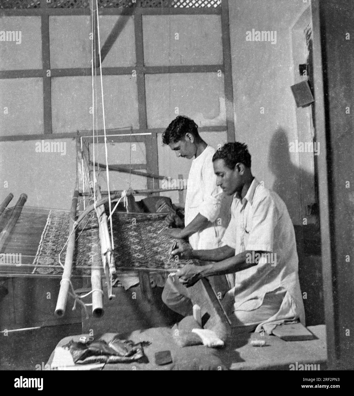 old vintage 1900s black and white picture of Indian wooden handloom ...