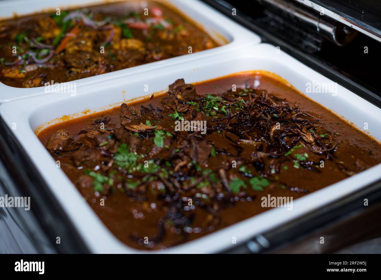 Variety of foods, potatoes, Ugali and dry fish, Chapati and beef stew ...