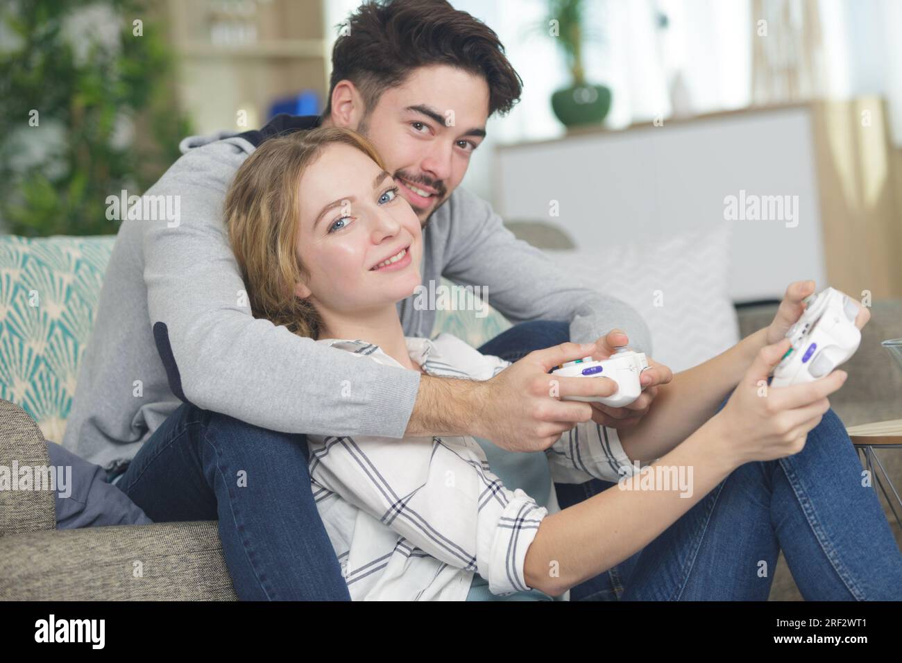 gamer woman playing boyfriend Stock Photo - Alamy