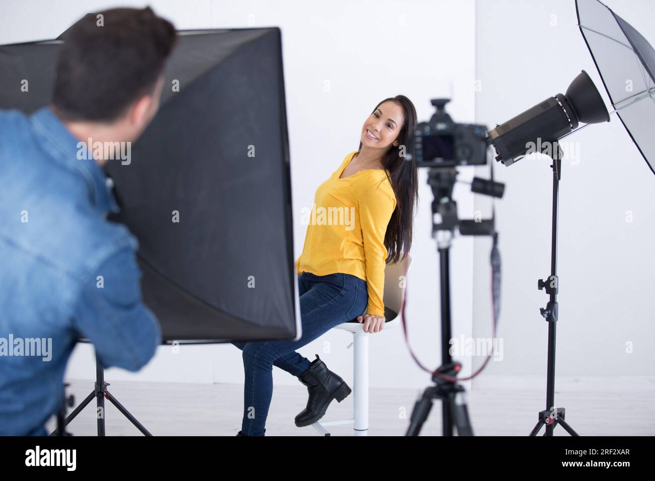 Woman posing photographer during hi-res stock photography and images ...