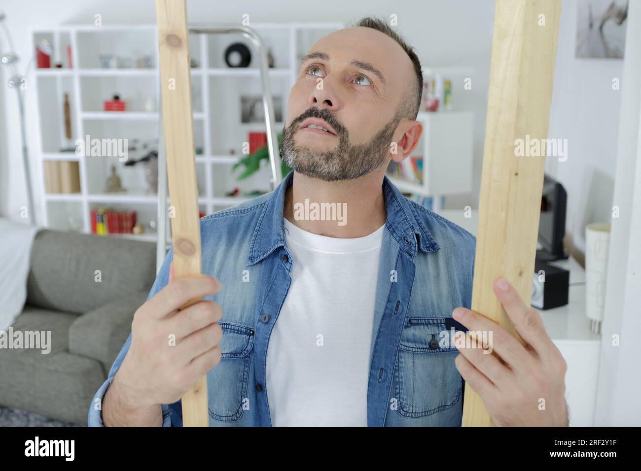 Man planning wood in workshop hi-res stock photography and images - Alamy