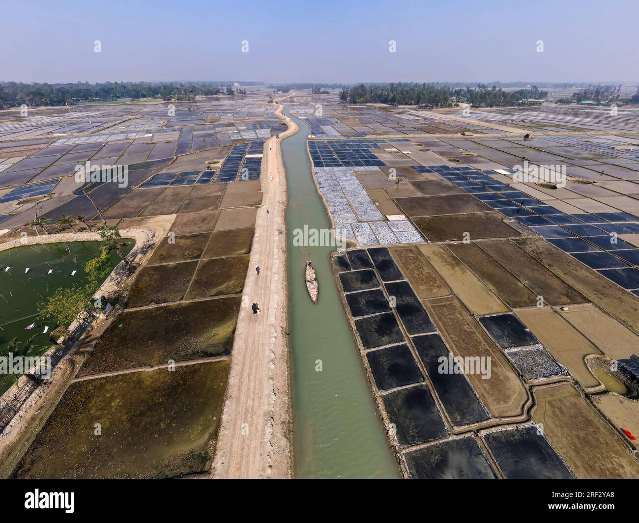 An aerial view of a natural salt field in the large area of the ...