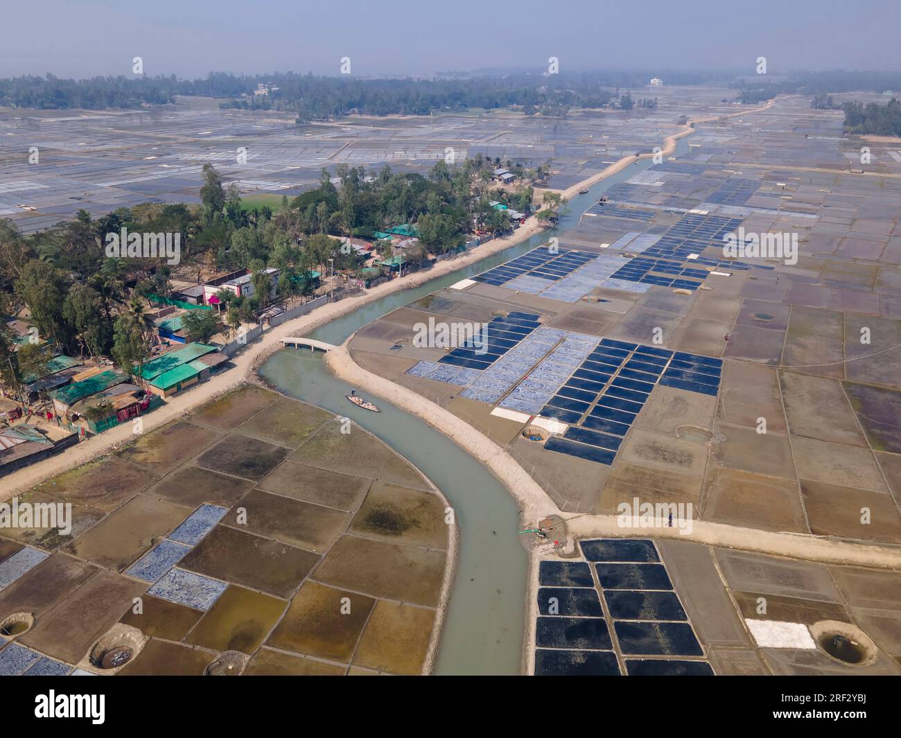 An aerial view of a natural salt field in the large area of the ...