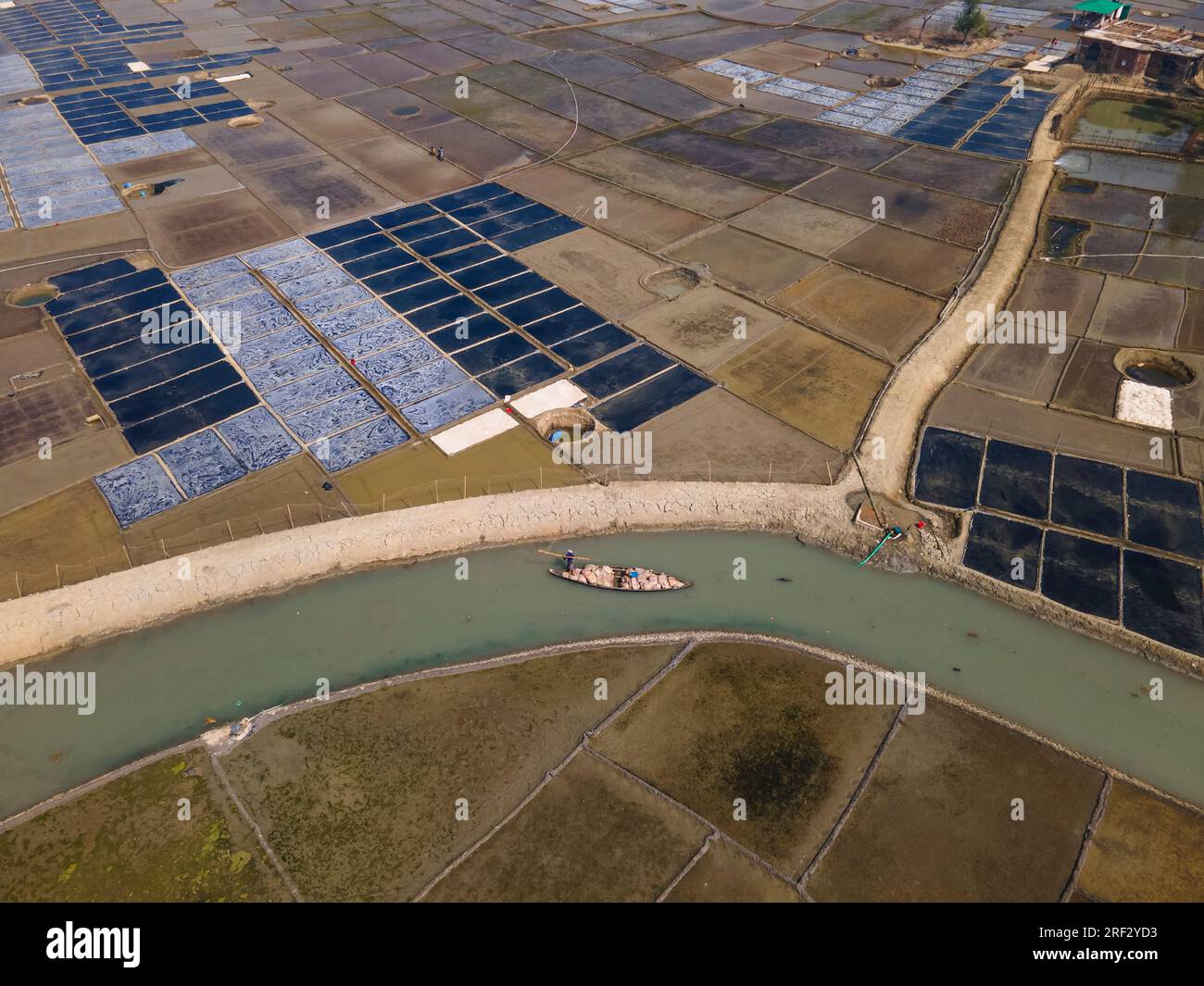 An aerial view of a natural salt field in the large area of the ...