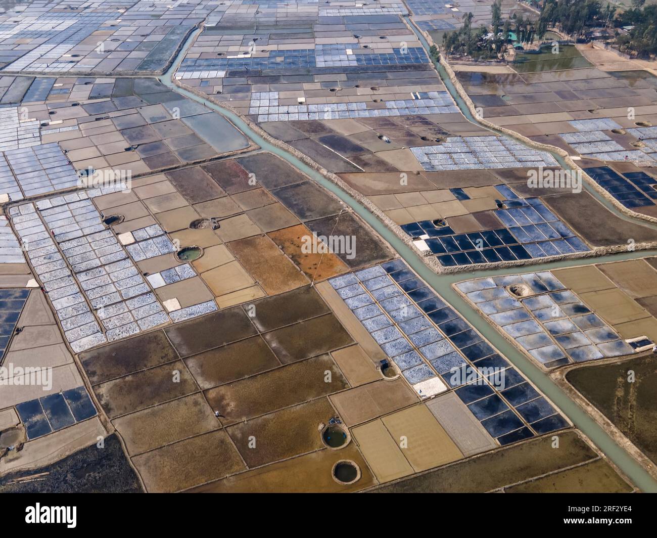 An aerial view of a natural salt field in the large area of the ...