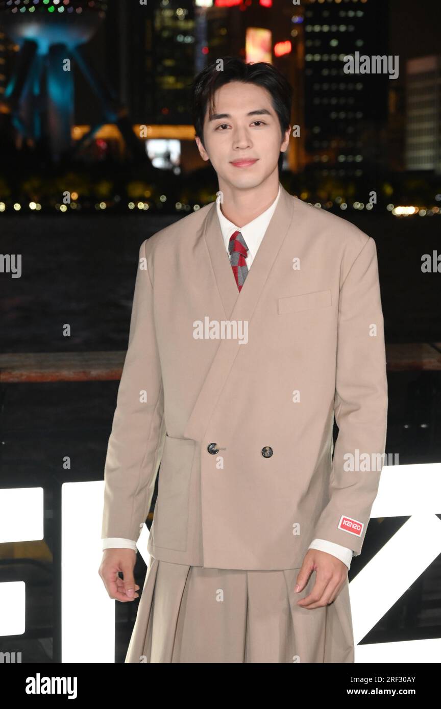 Chinese actor and singer-songwriter Xu Weizhou attends a fashion show ...