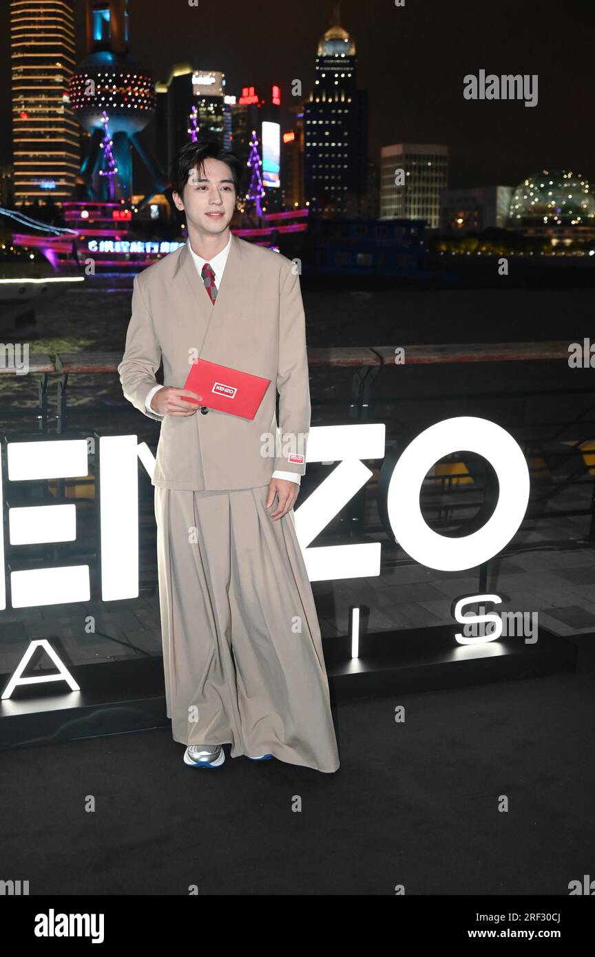 Chinese actor and singer-songwriter Xu Weizhou attends a fashion show ...