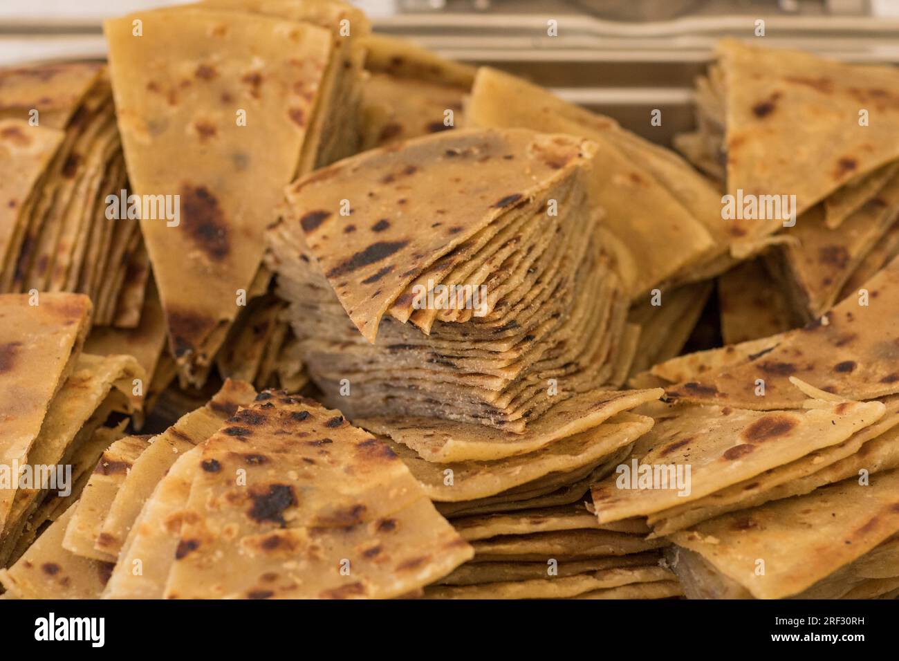 Variety of foods, potatoes, Ugali and dry fish, Chapati and beef stew ...