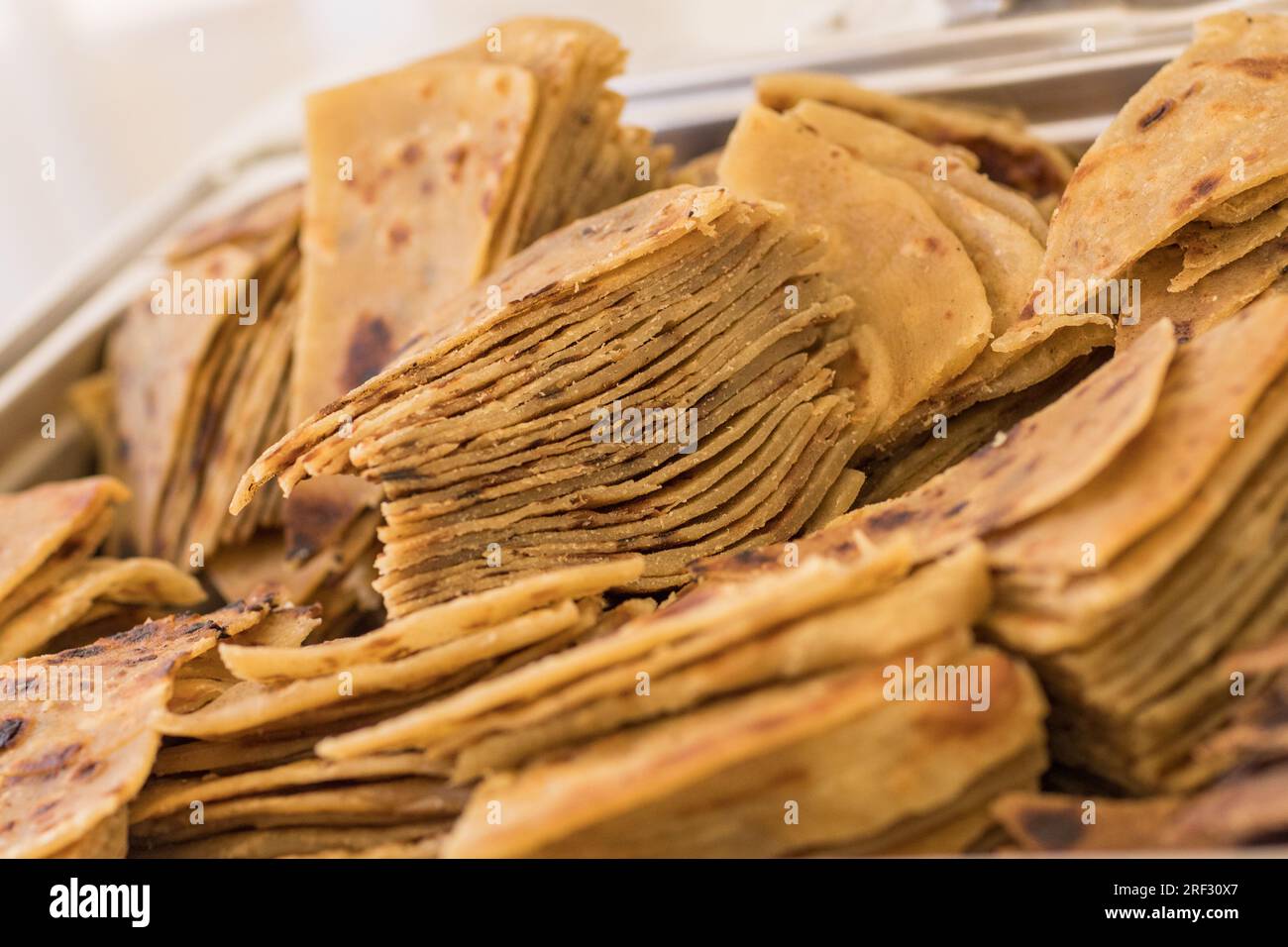 Variety of foods, potatoes, Ugali and dry fish, Chapati and beef stew ...