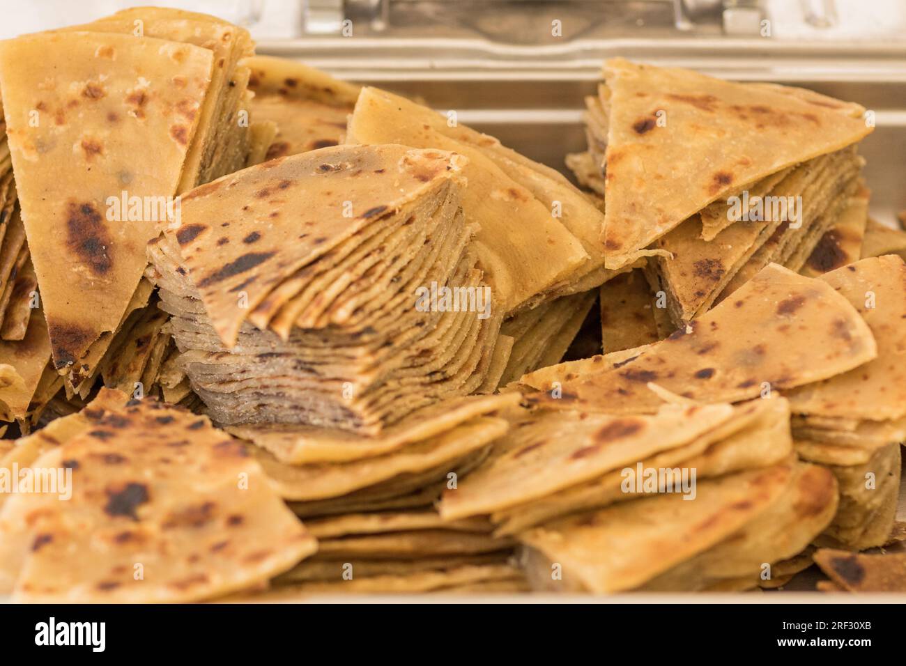 Variety of foods, potatoes, Ugali and dry fish, Chapati and beef stew ...