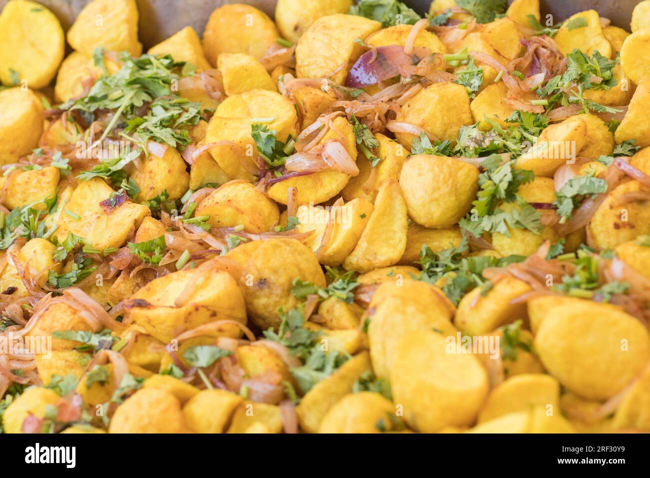 Variety of foods, potatoes, Ugali and dry fish, Chapati and beef stew ...