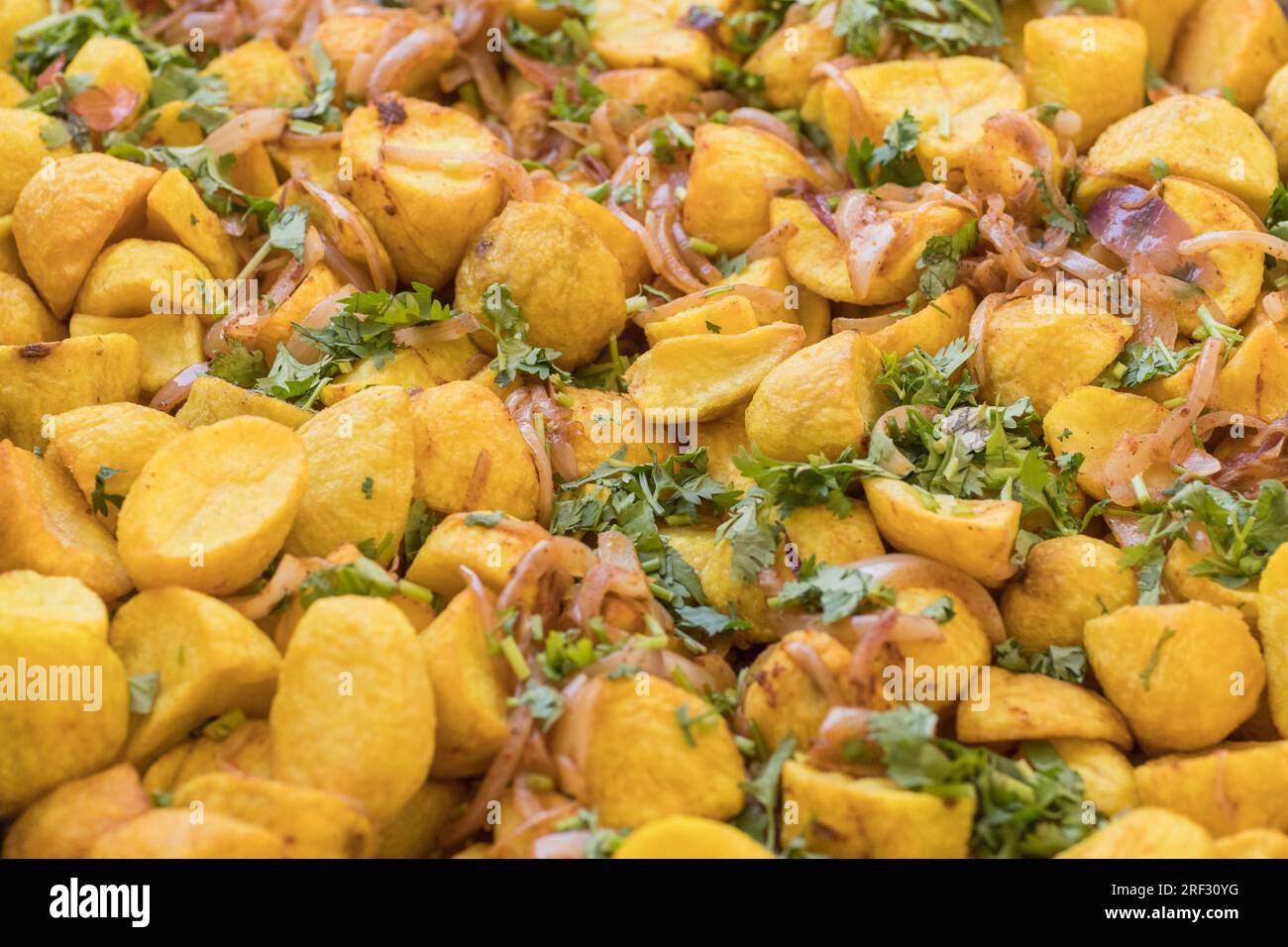 Variety of foods, potatoes, Ugali and dry fish, Chapati and beef stew ...