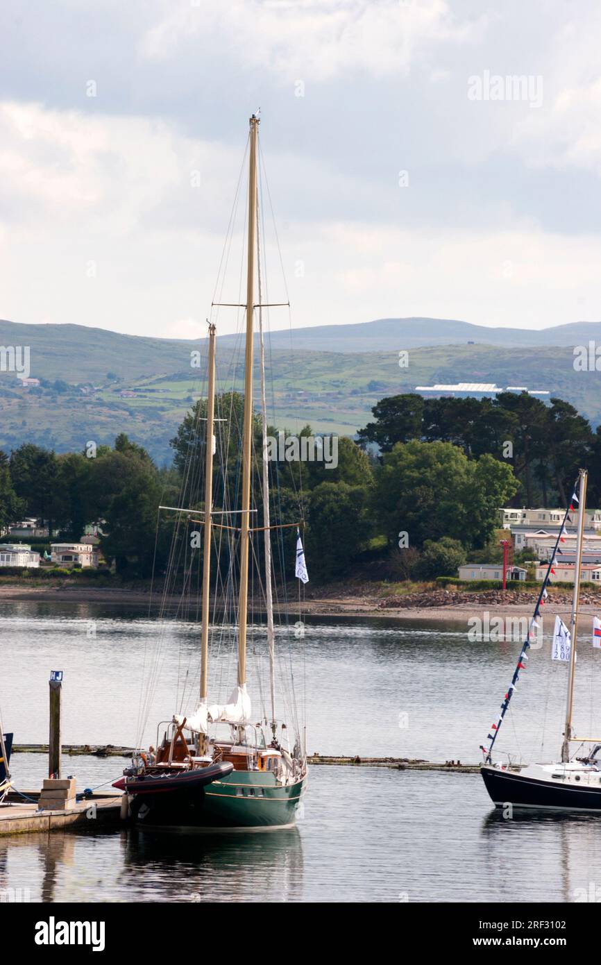 Yacht moored at Rhu Marina, Gareloch,with Rosneath penisula and caravan ...