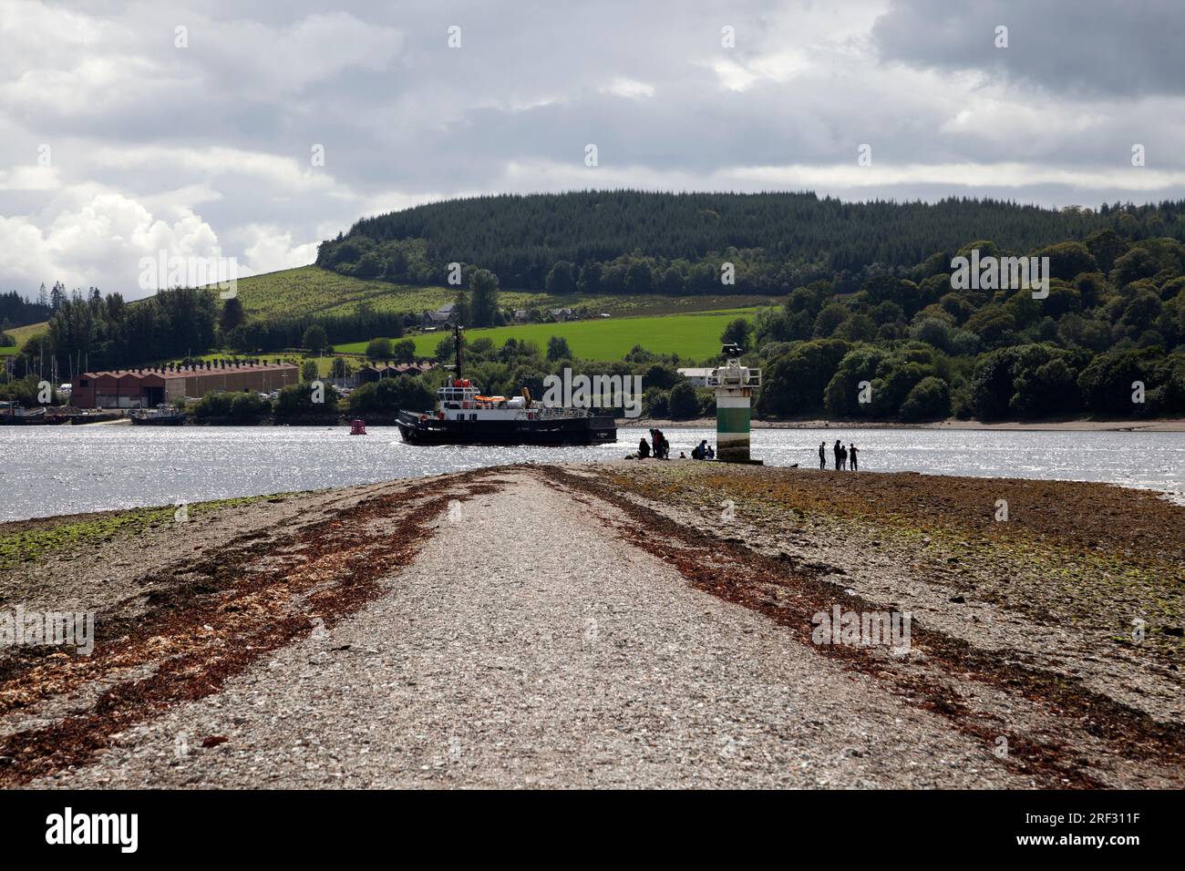 SD Oransay passing the end of Rhu Point, with the navigation light and ...