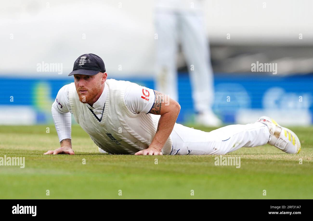 England's Ben Stokes looks on after trying to claim the ball with ...