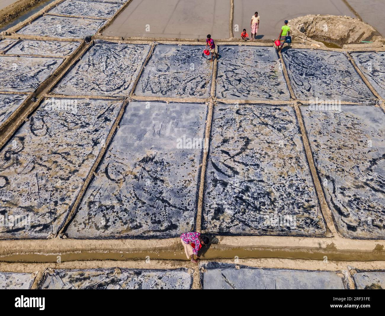 An aerial view of the salt field in the large area of the seashore of ...