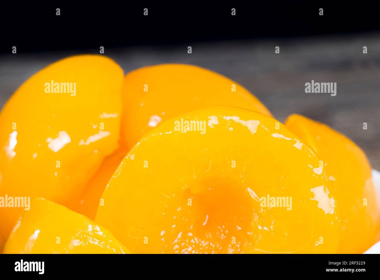 canned ripe orange peaches, fruit preserved in sweet syrup with sugar ...