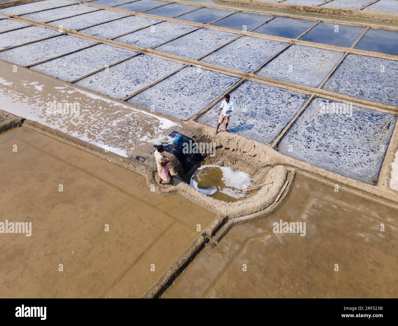 An aerial view of a natural salt field in the large area of the ...