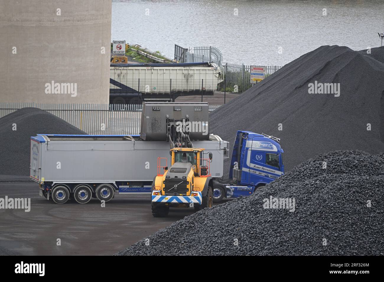 Coal being shipped from Belfast Docks Northern Ireland Stock Photo - Alamy