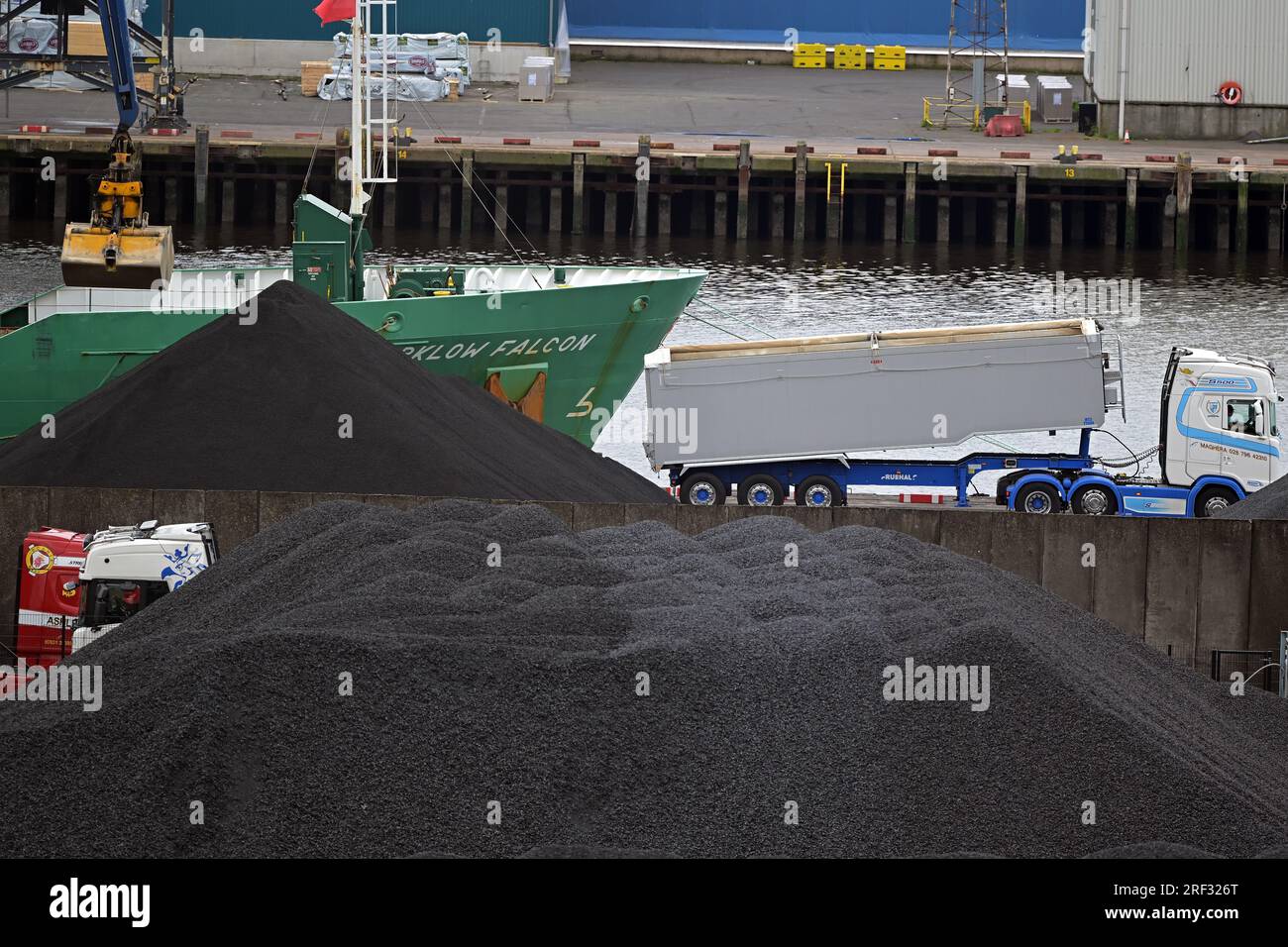 Coal being shipped from Belfast Docks Northern Ireland Stock Photo - Alamy
