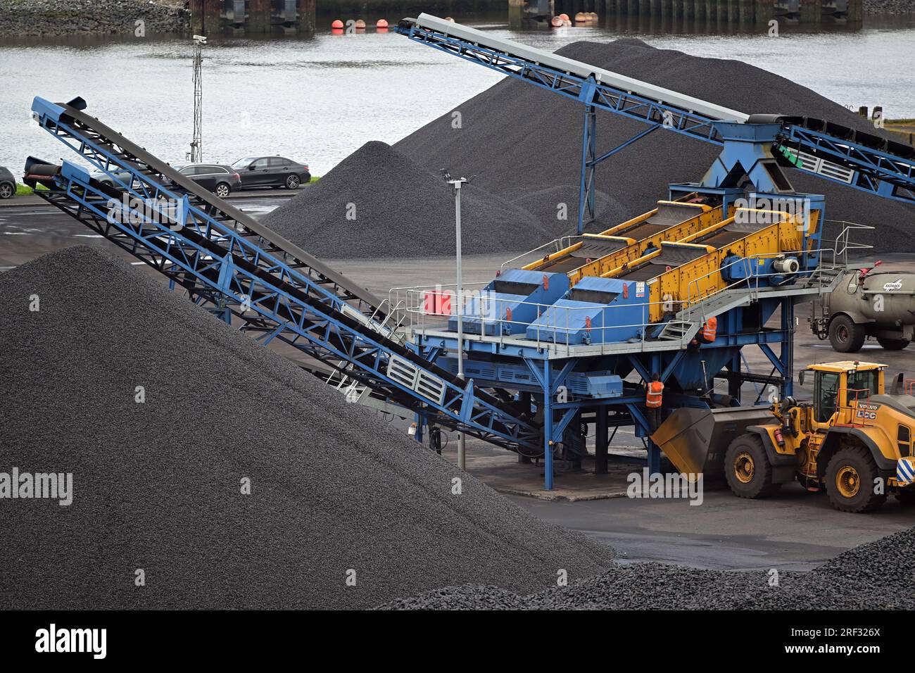Coal being shipped from Belfast Docks Northern Ireland Stock Photo - Alamy