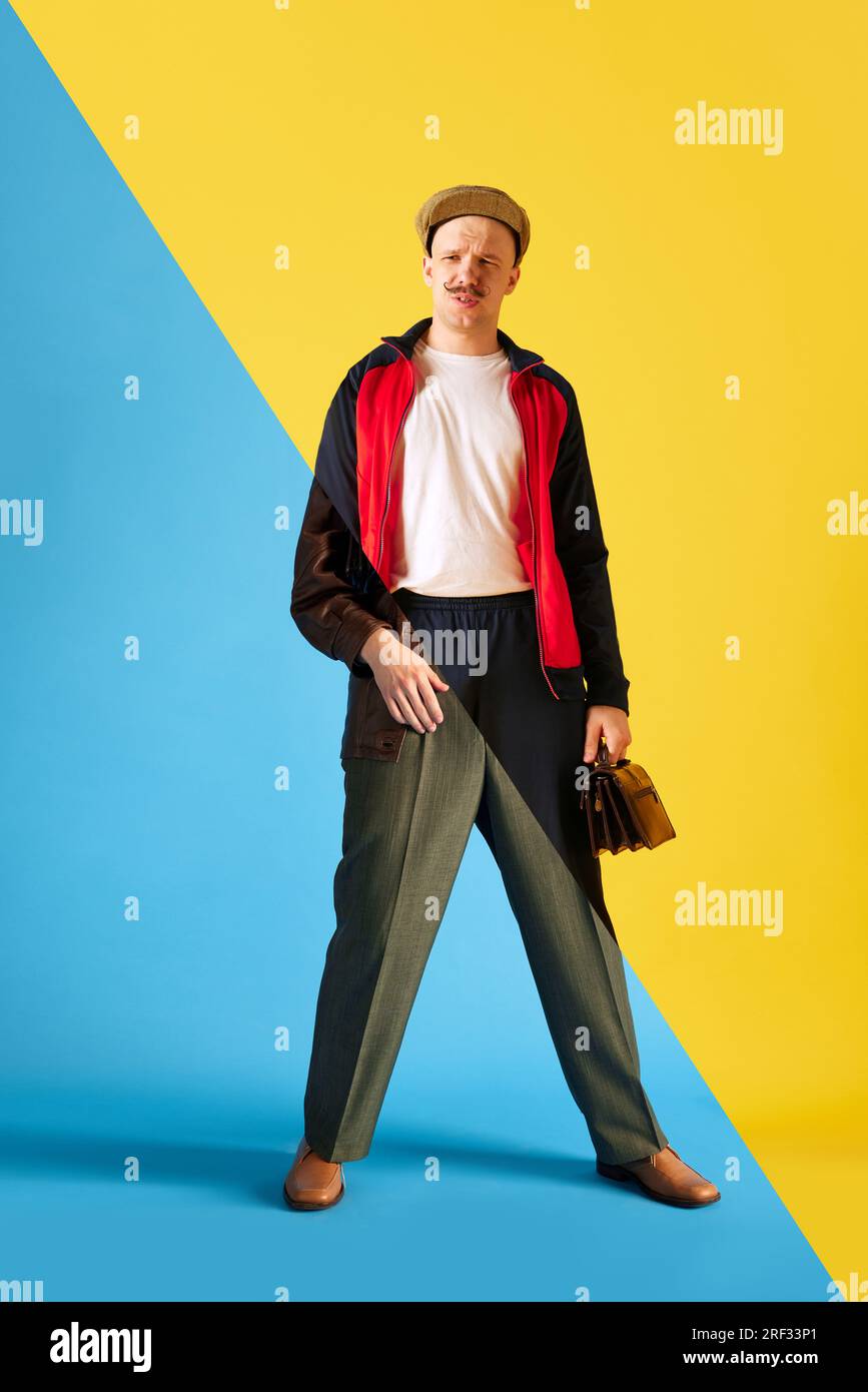 Creative collage of two halves of emotional young man in various ...