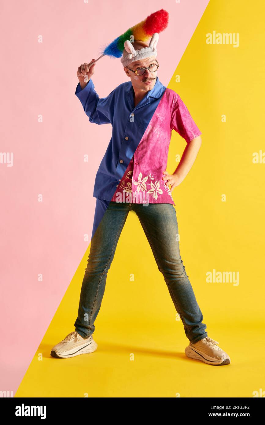 Creative collage of two halves of emotional young man in various ...