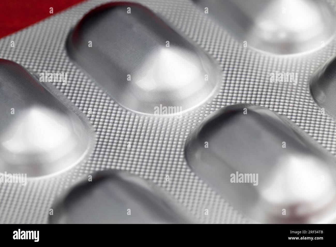 packaged in a shiny blister, medicines for the treatment of diseases ...