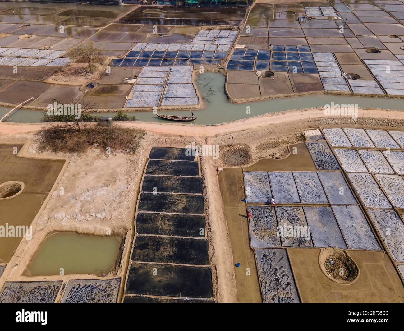 An aerial view of a natural salt field in the large area of the ...