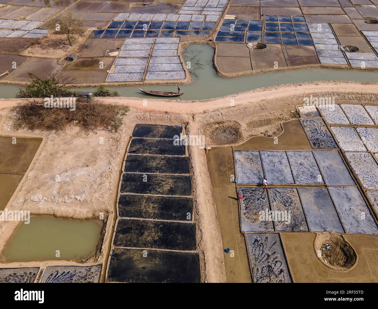 An aerial view of a natural salt field in the large area of the ...