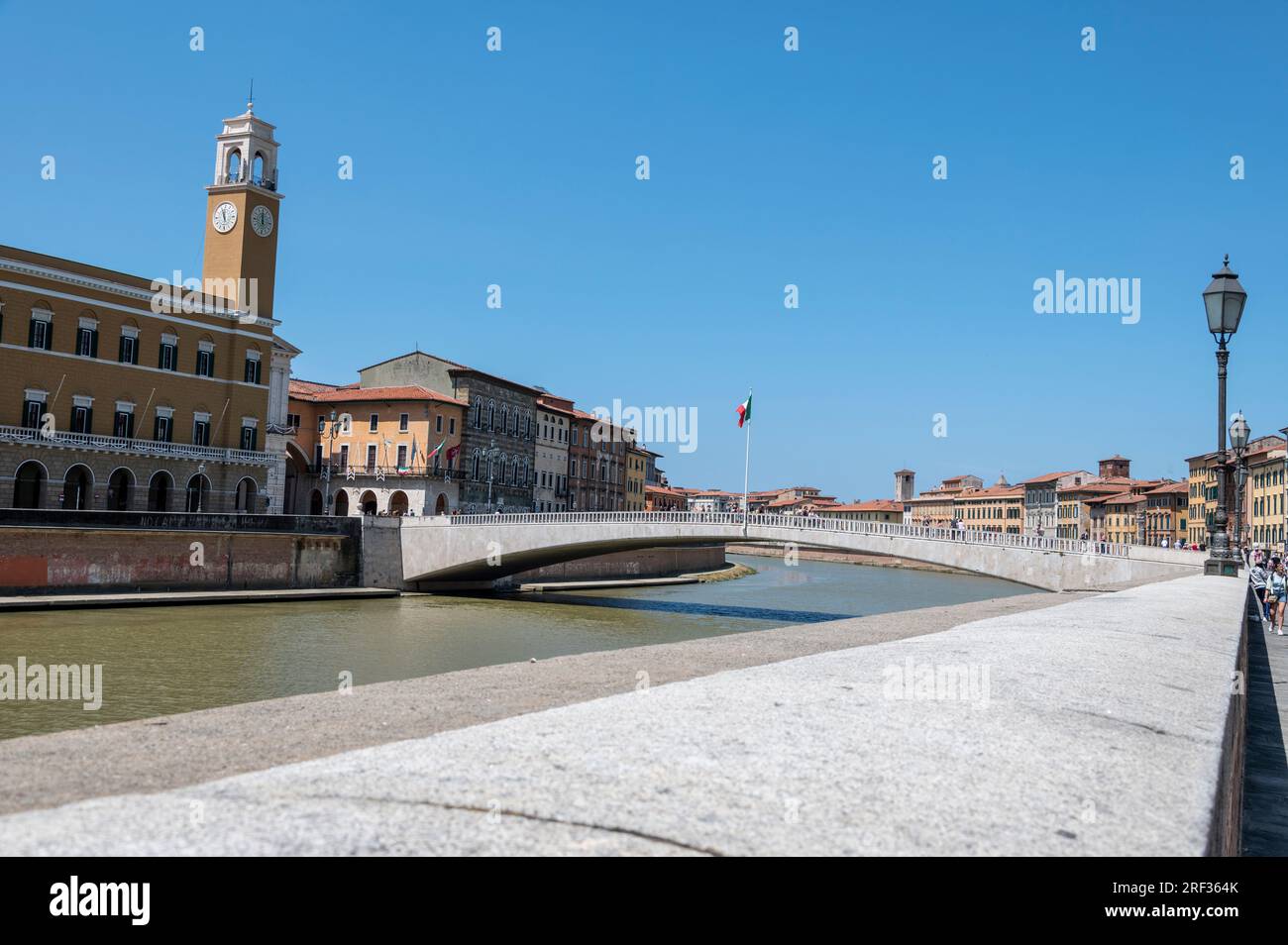 Skyline of Pisa on the Amo River flowing through the city under the ...