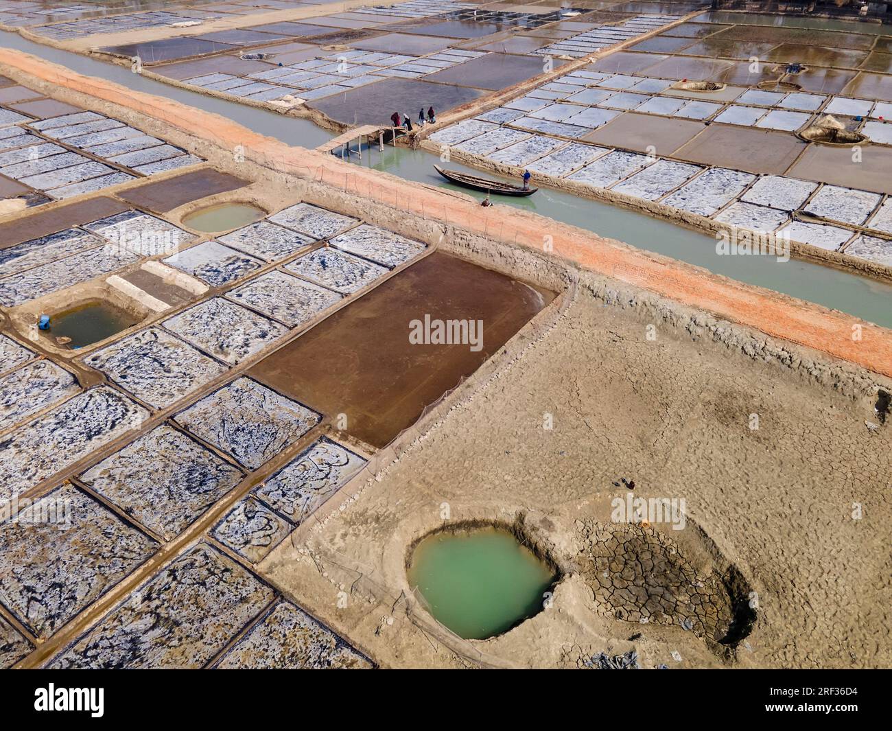 An aerial view of a natural salt field in the large area of the ...