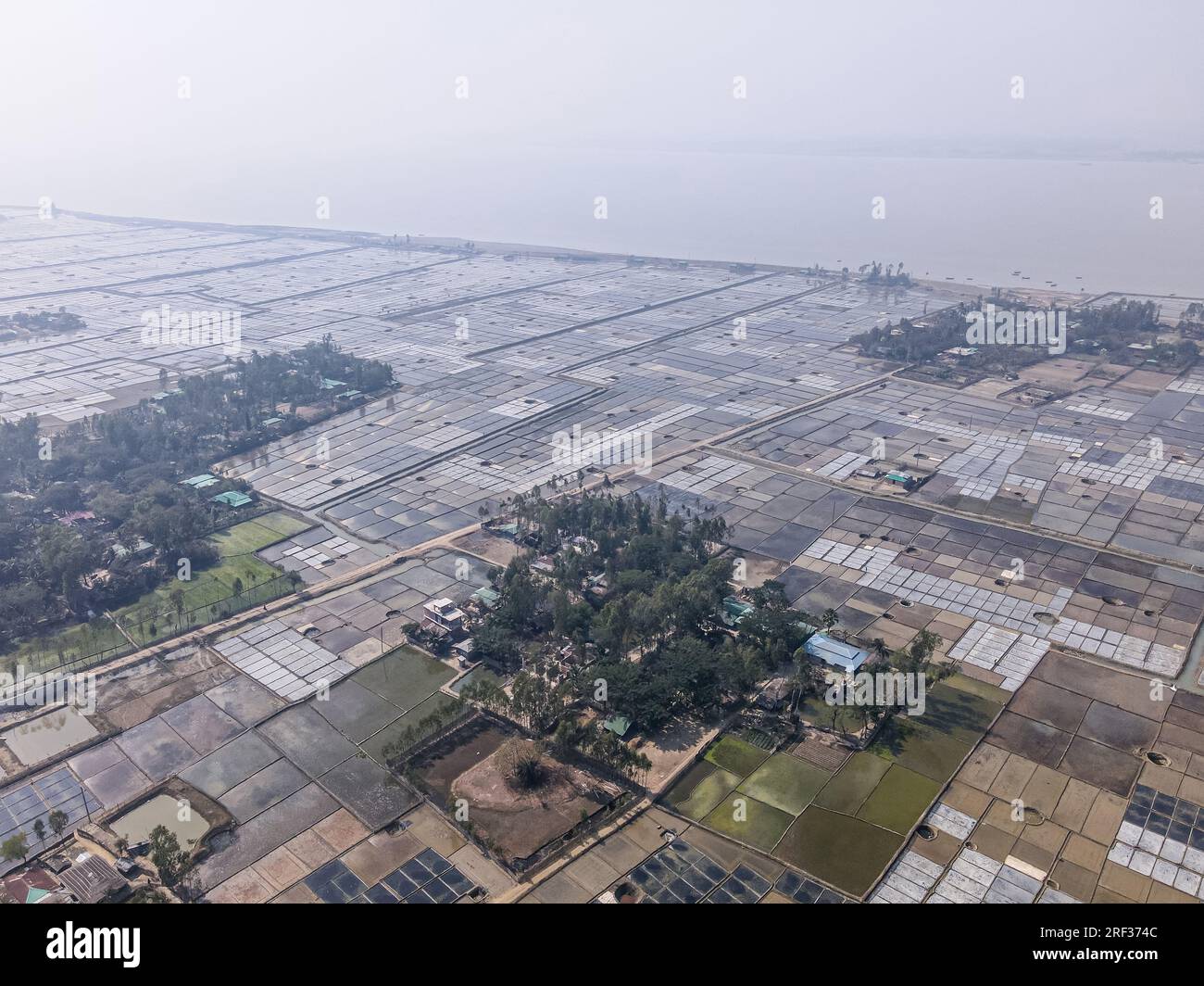 An aerial view of a natural salt field in the large area of the ...