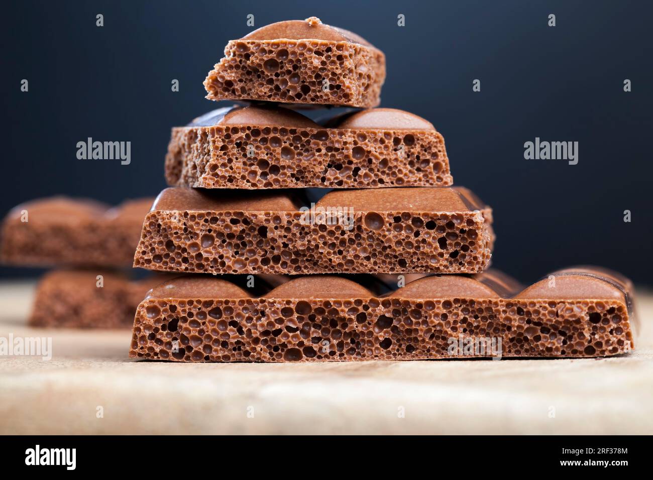 divided into pieces chocolate bar, air milk chocolate broken into ...